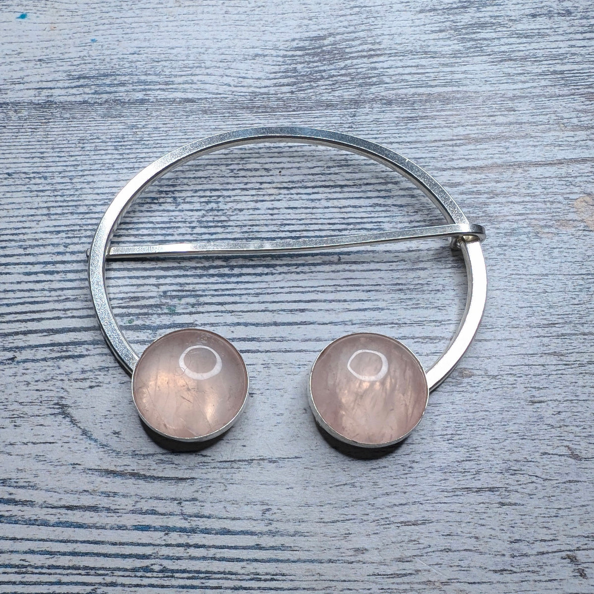 giant rose quartz penannular pin – An Caitín Beag